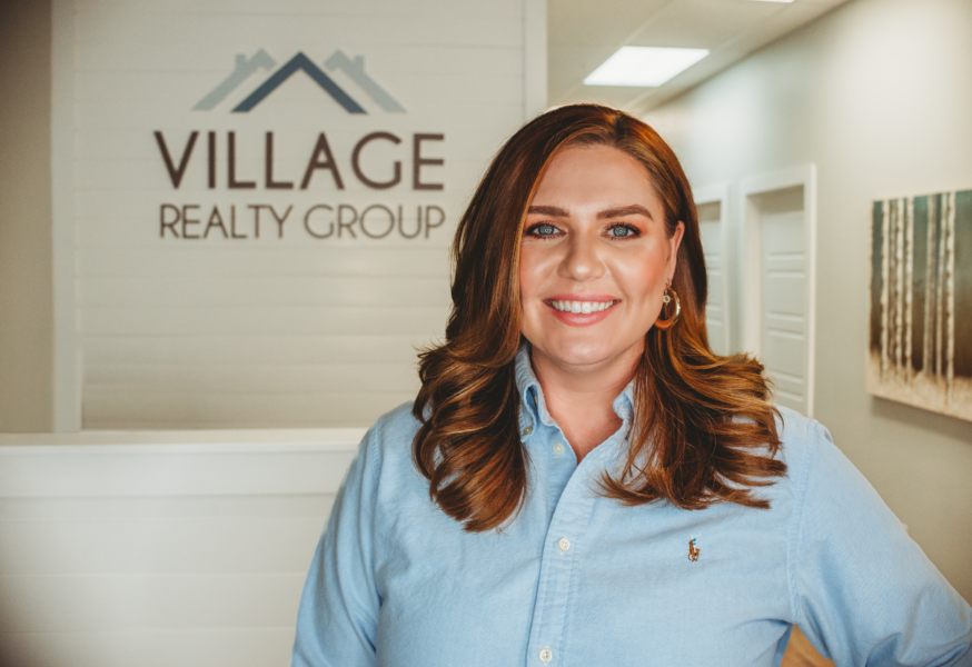 Kelsey Wells - Village Realty Group